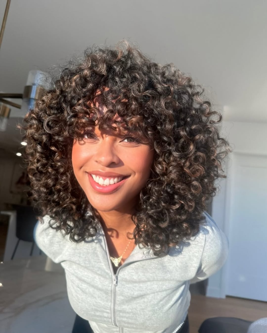 30 Layered Curly Haircuts 2025: Trendy, Voluminous and Chic Styles for ...